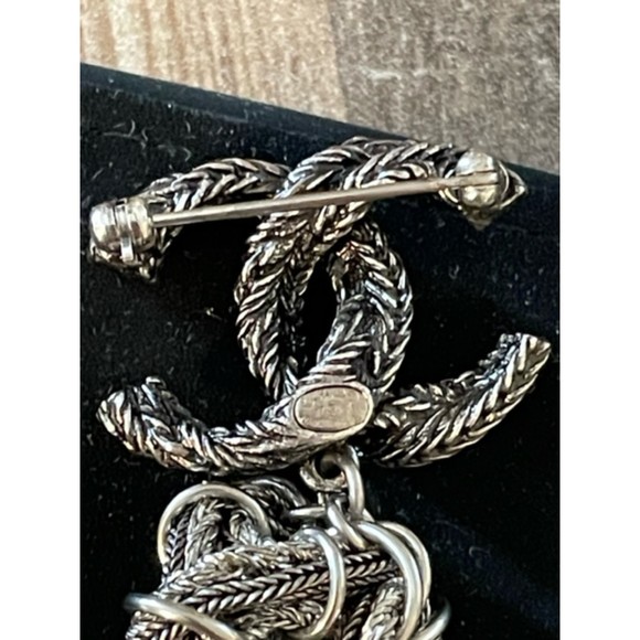 CHANEL | Jewelry | Chanel Ruthenium Silver Metal Cc Knot Tassel Fringe ...